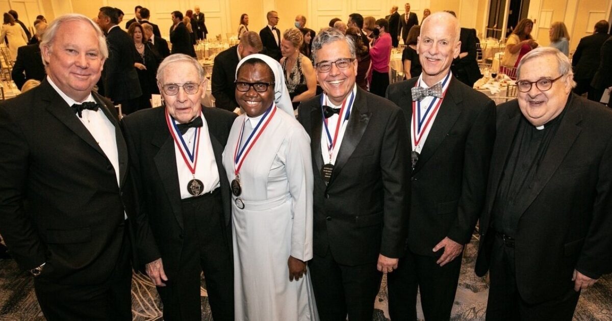 At annual dinner, John Carroll Society honors four and hears talk on ...