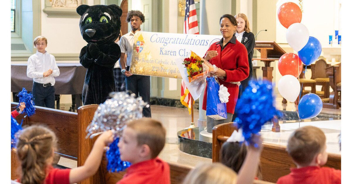 At surprise ceremony, Karen Clay, principal of St. Peter School on ...